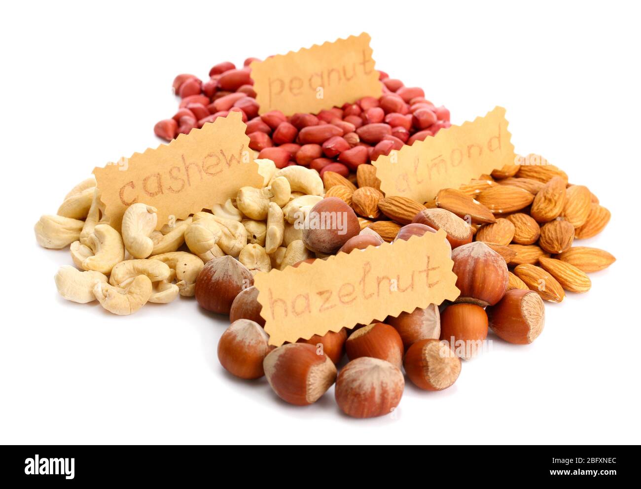 assortment of tasty nuts, isolated on white Stock Photo - Alamy
