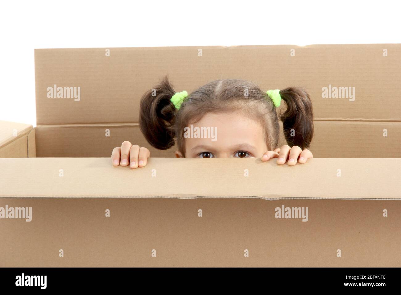beautiful little girl with box isolated on white Stock Photo - Alamy