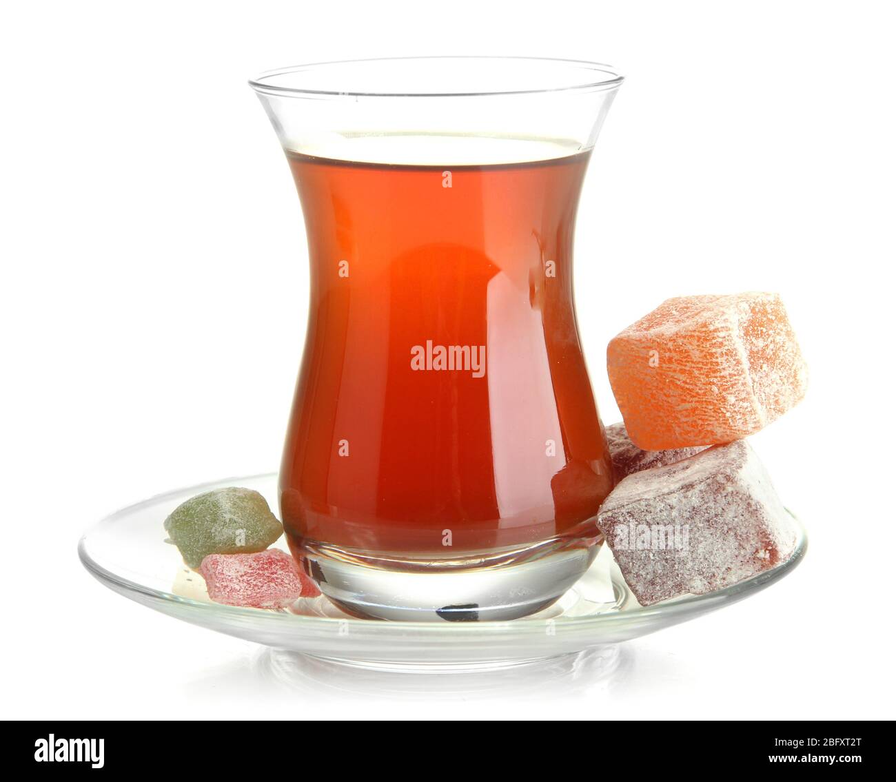 glass of Turkish tea and rahat Delight, isolated on white Stock Photo ...
