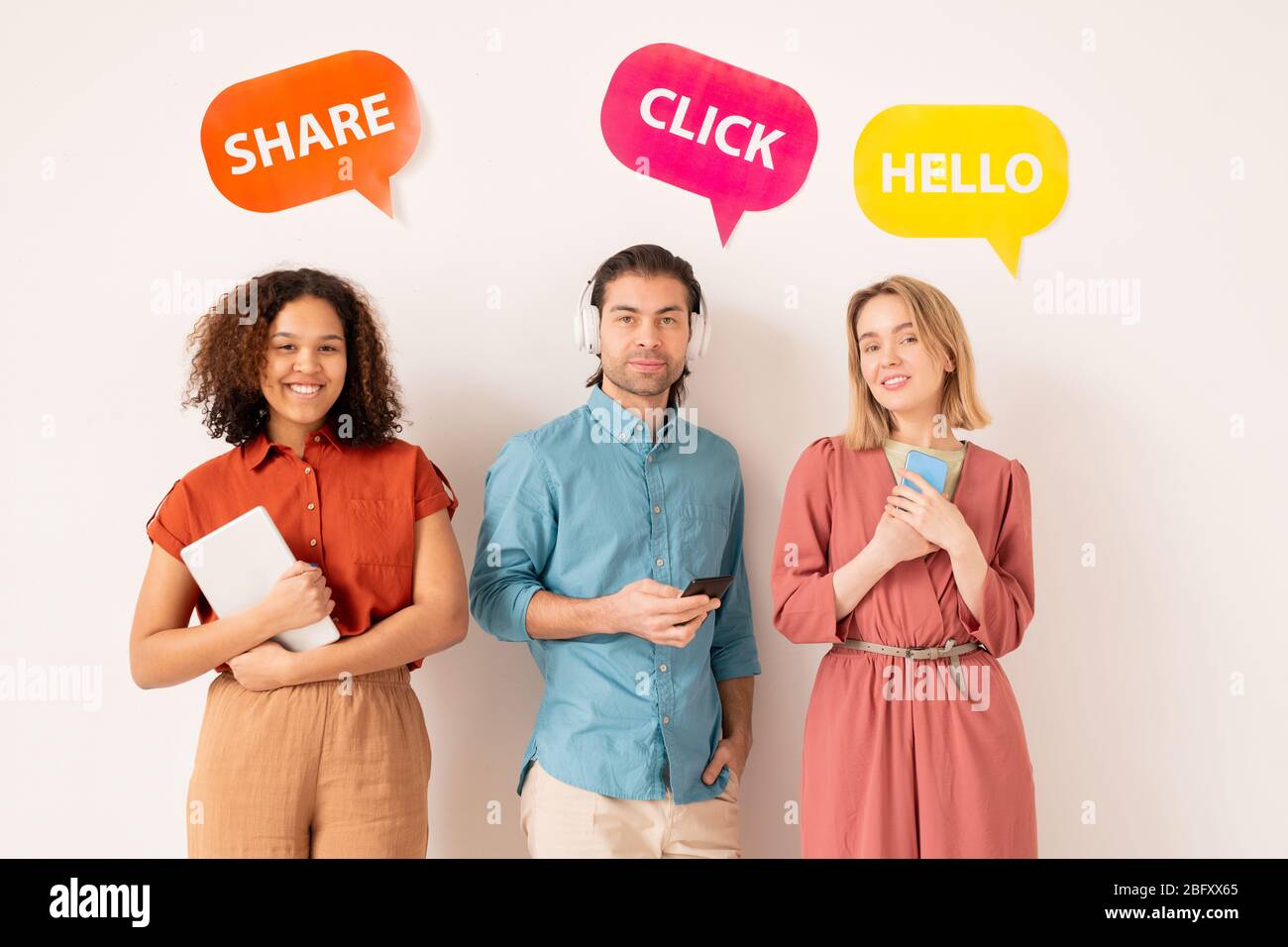 Portrait of positive modern multi-ethnic people interacting on social ...