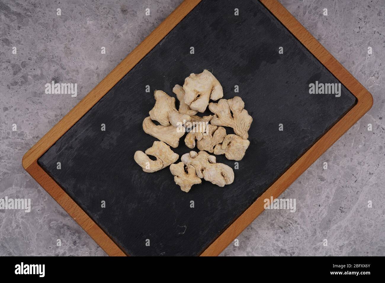 Dry ginger root Stock Photo - Alamy