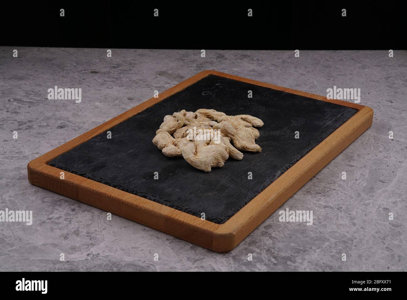 Dry ginger root Stock Photo - Alamy