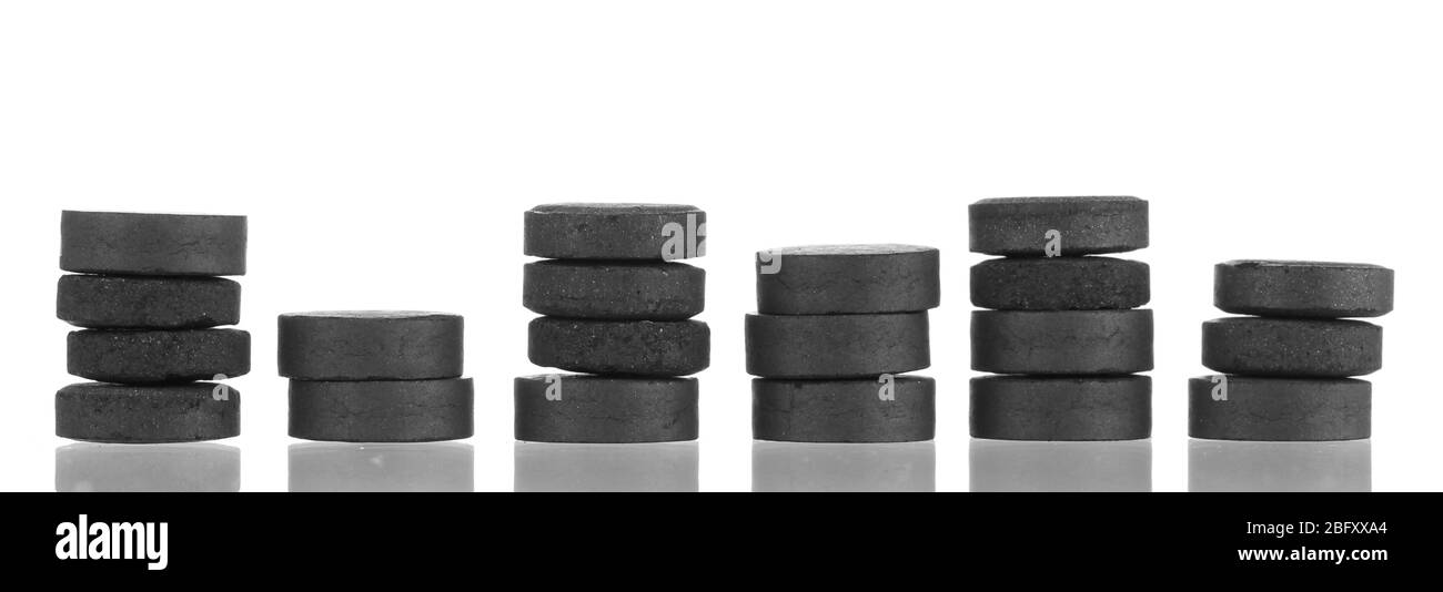 activated carbon in tablets isolated on white Stock Photo - Alamy