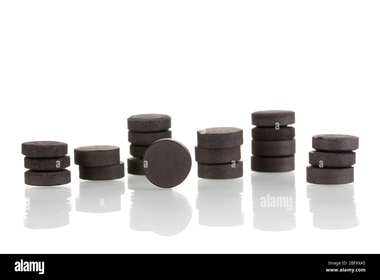 activated carbon in tablets isolated on white Stock Photo - Alamy