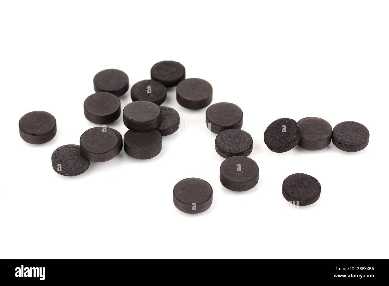 activated carbon in tablets isolated on white Stock Photo - Alamy