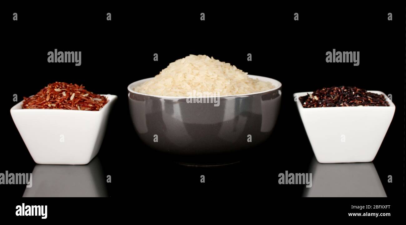 Various kinds of rice isolated on black Stock Photo - Alamy