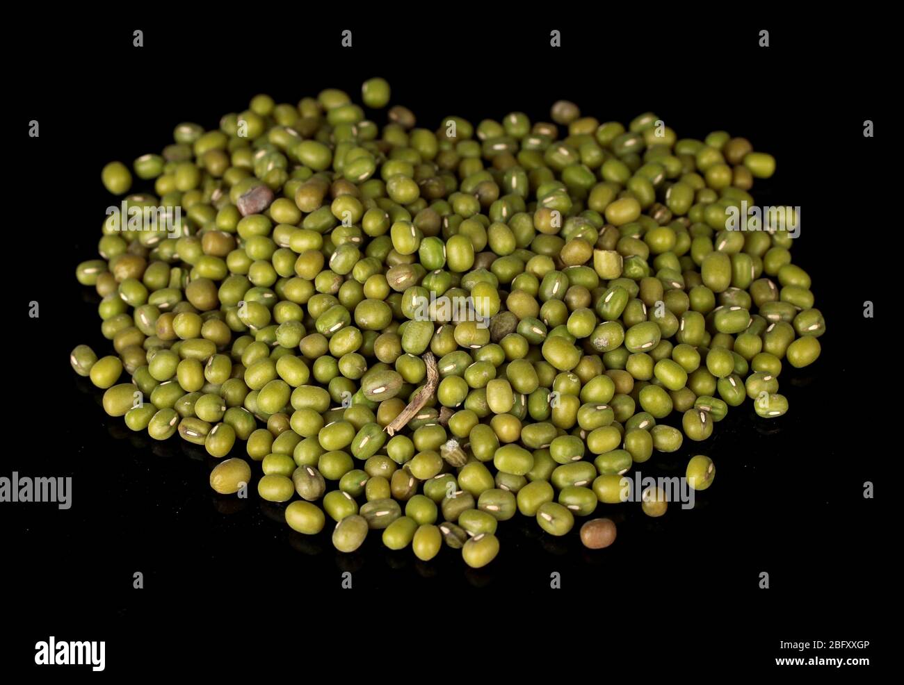 Mung beans isolated on black Stock Photo - Alamy