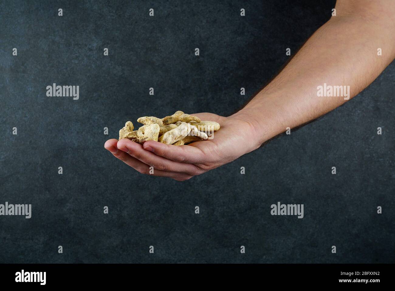 Dry ginger root Stock Photo - Alamy