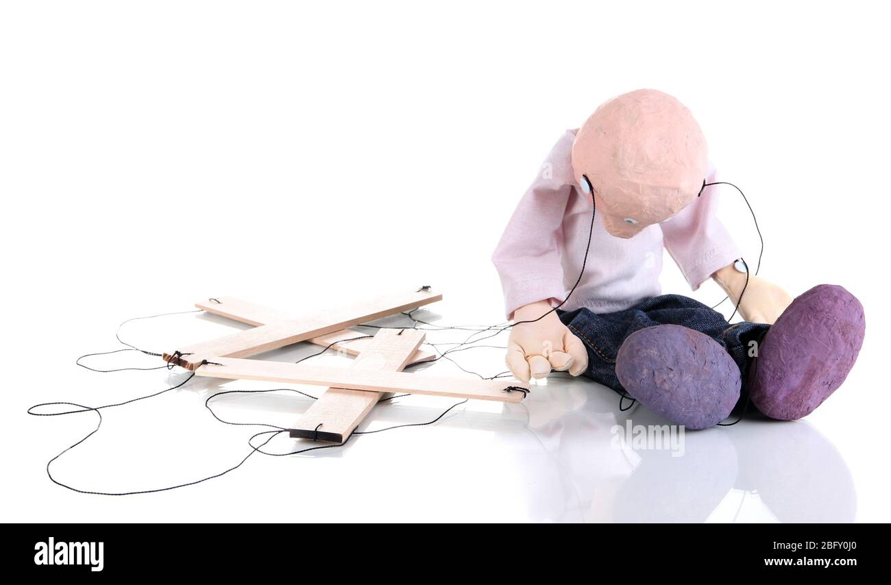 Wooden puppet sitting isolated on white Stock Photo - Alamy