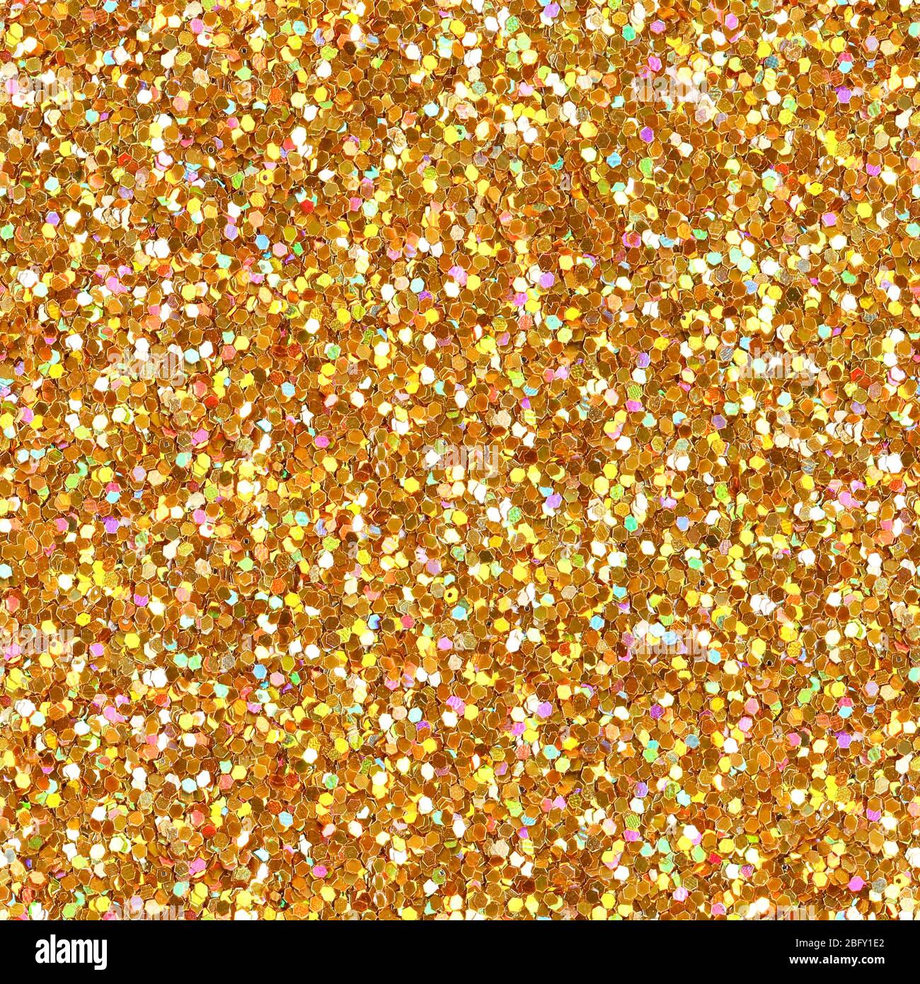 Detailed texture of glittering golden dust surface. Seamless square ...