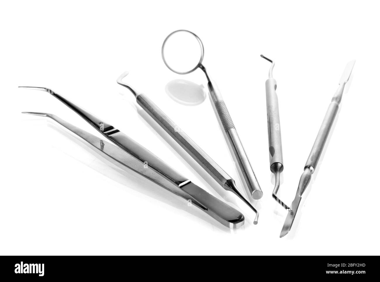 Set of dental tools for teeth care isolated on white Stock Photo - Alamy
