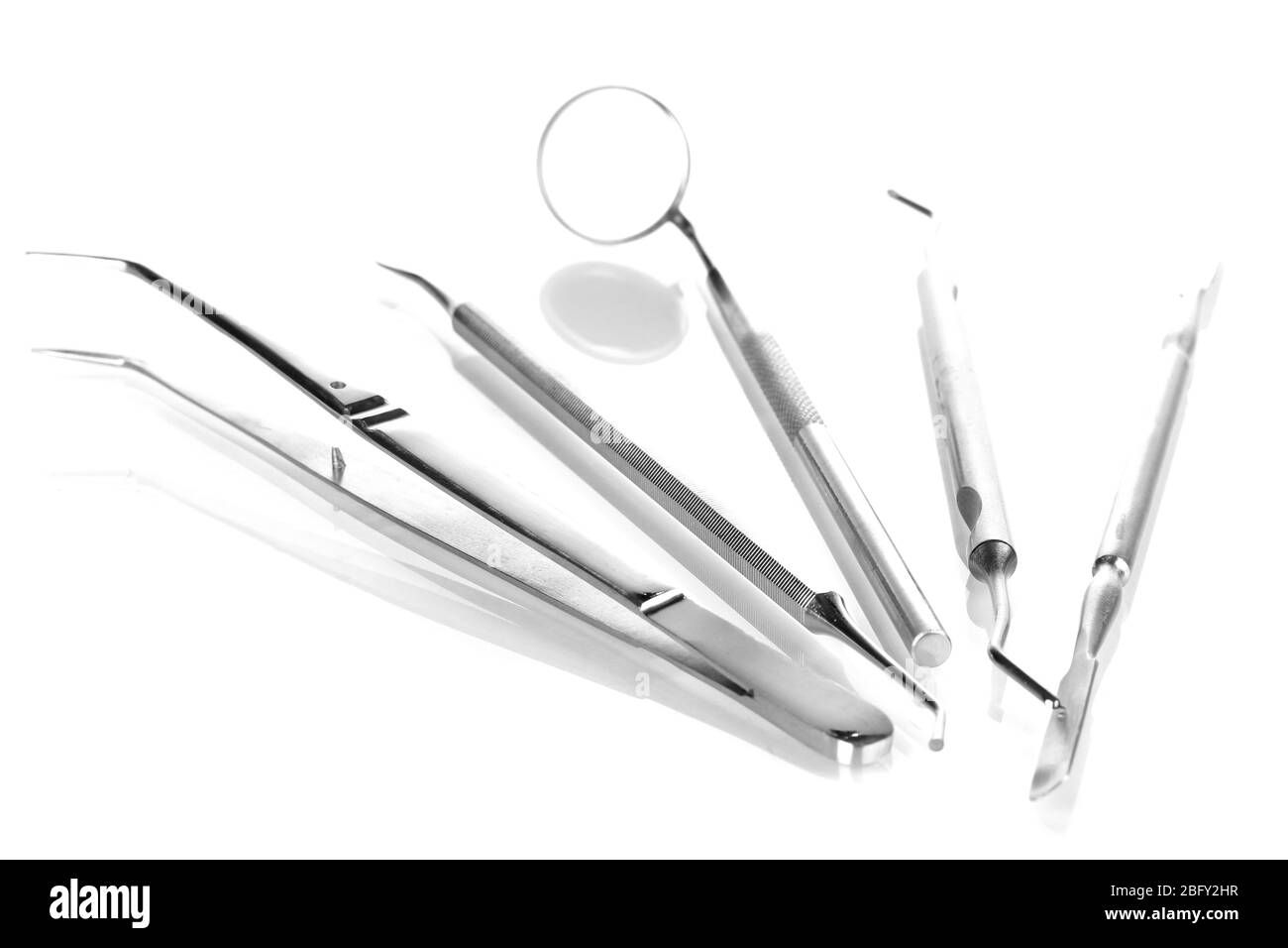 Set of dental tools for teeth care isolated on white Stock Photo - Alamy