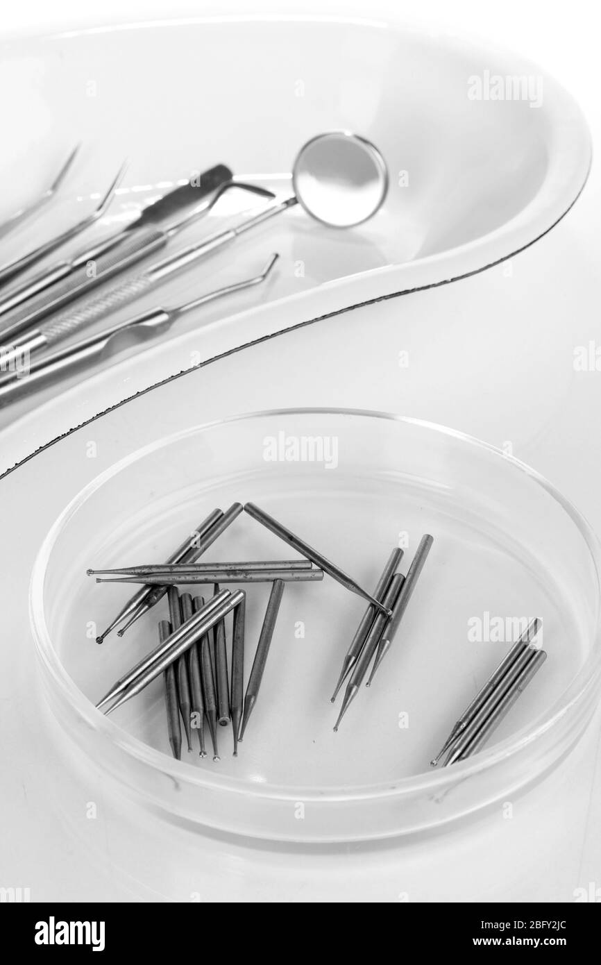 Set of dental tools for teeth care isolated on white Stock Photo - Alamy