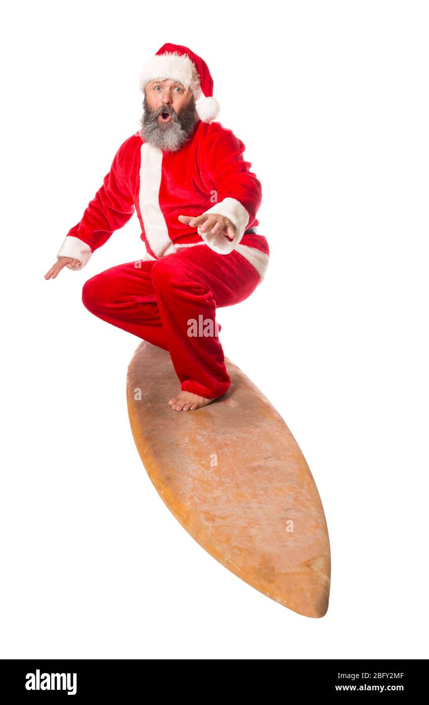 Father christmas surfboard beach hi-res stock photography and images ...