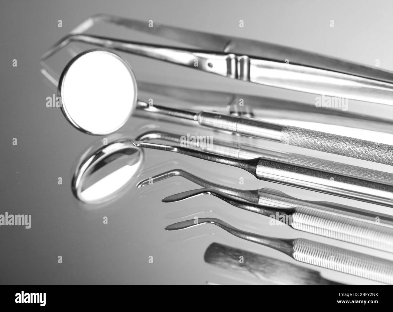 Set of dental tools for teeth care isolated on grey background Stock ...