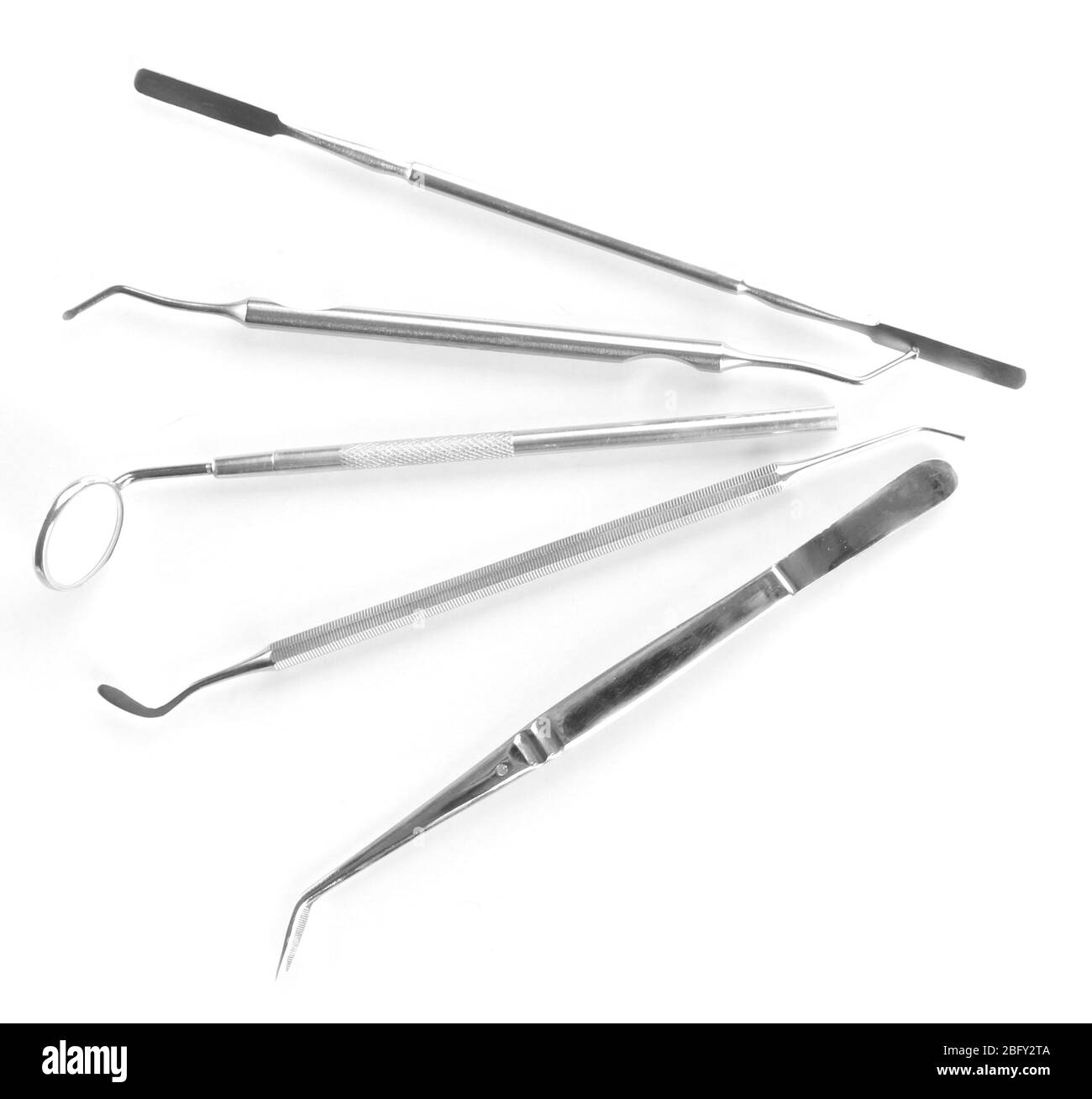 Set of dental tools for teeth care isolated on white Stock Photo - Alamy