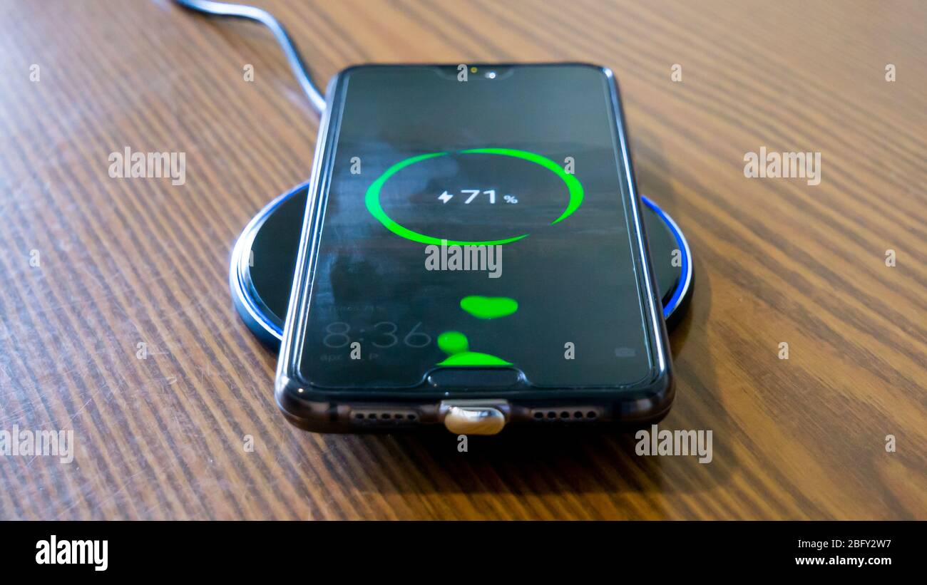 Induction charging hi-res stock photography and images - Alamy
