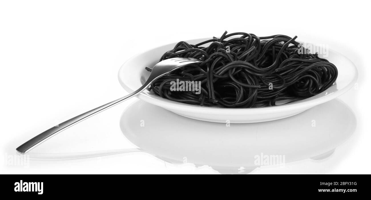 Black spaghetti isolated on white Stock Photo - Alamy
