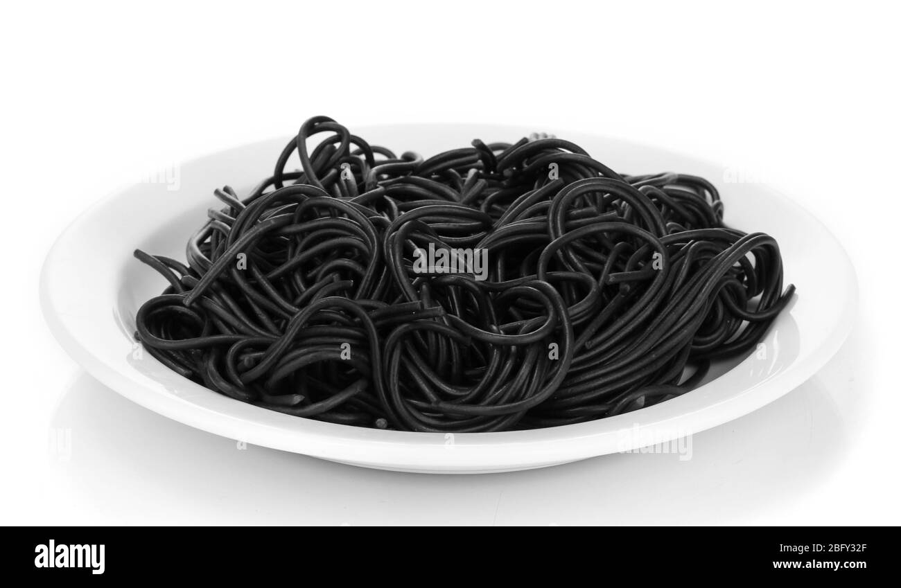 Black spaghetti isolated on white Stock Photo - Alamy