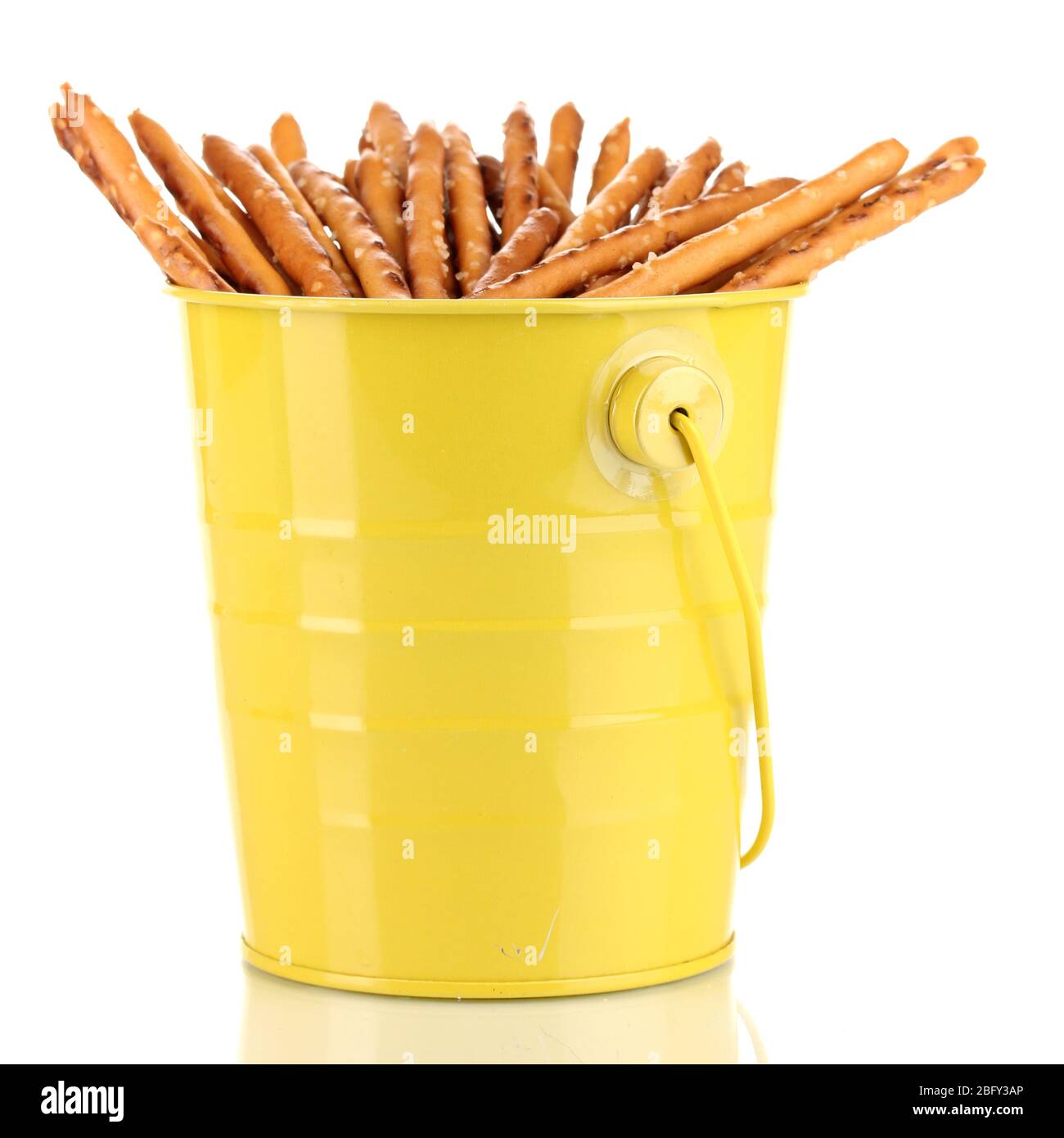 Tasty crispy sticks in yellow pail isolated on white Stock Photo - Alamy