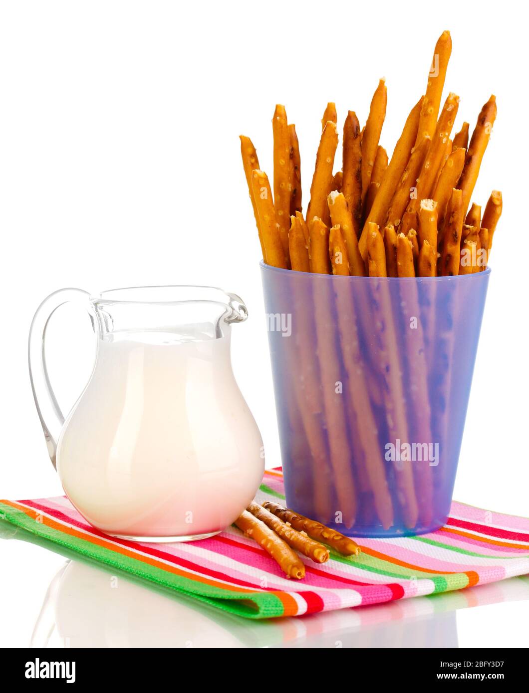 Tasty crispy sticks in purple plastic cup isolated on white Stock Photo ...