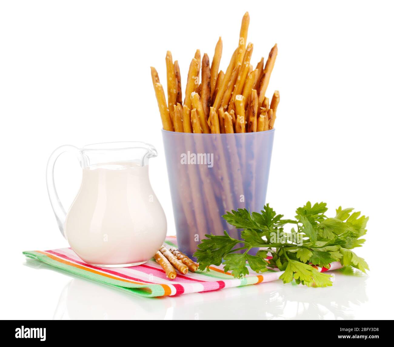 Tasty crispy sticks in purple plastic cup isolated on white Stock Photo ...