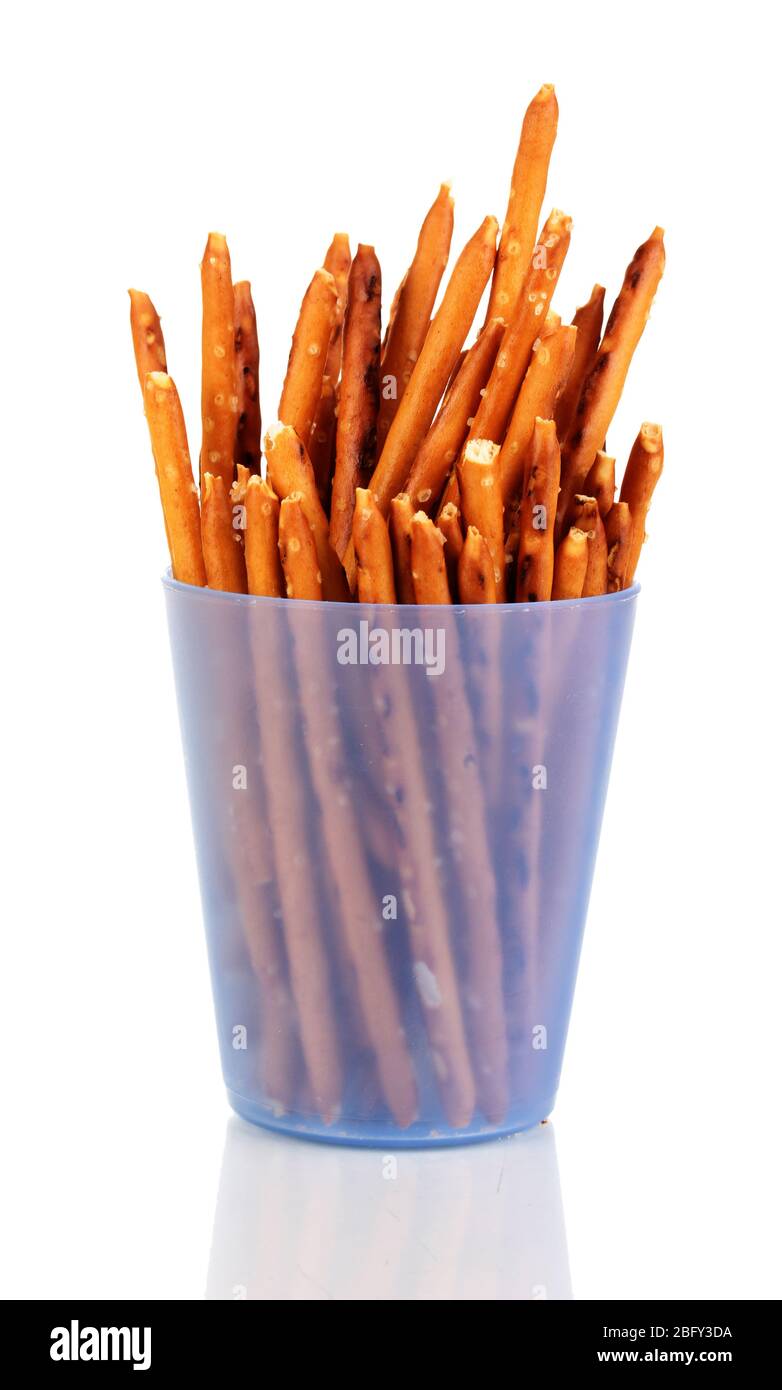 Tasty crispy sticks in purple plastic cup isolated on white Stock Photo ...