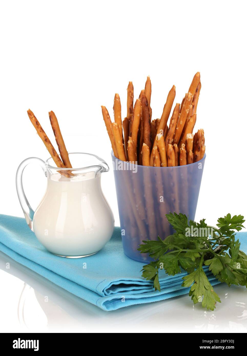 Tasty crispy sticks in purple plastic cup isolated on white Stock Photo ...
