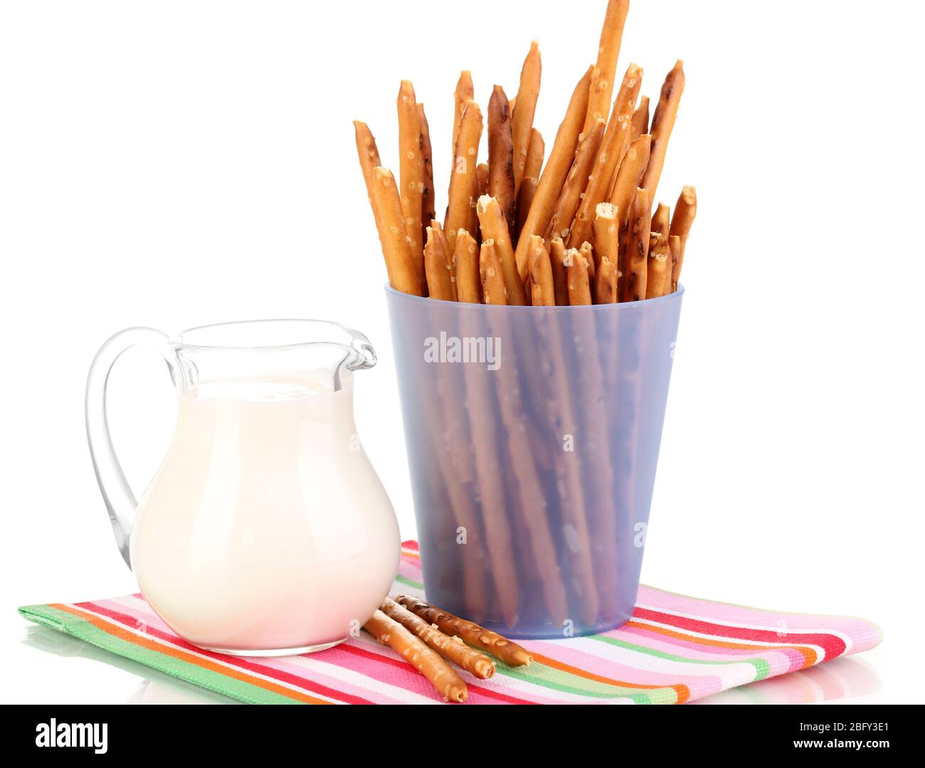 Tasty crispy sticks in purple plastic cup isolated on white Stock Photo ...