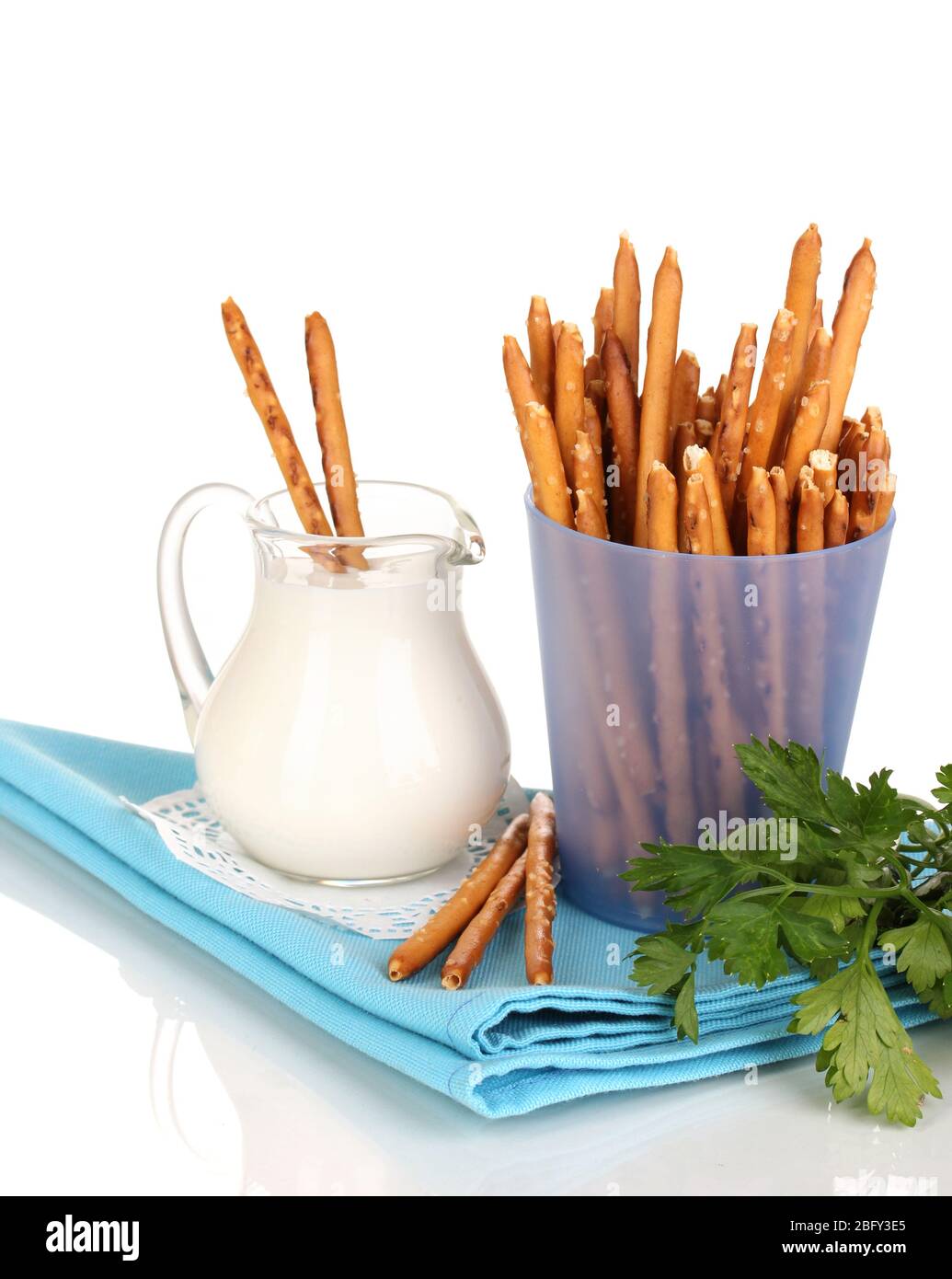Tasty crispy sticks in purple plastic cup isolated on white Stock Photo ...
