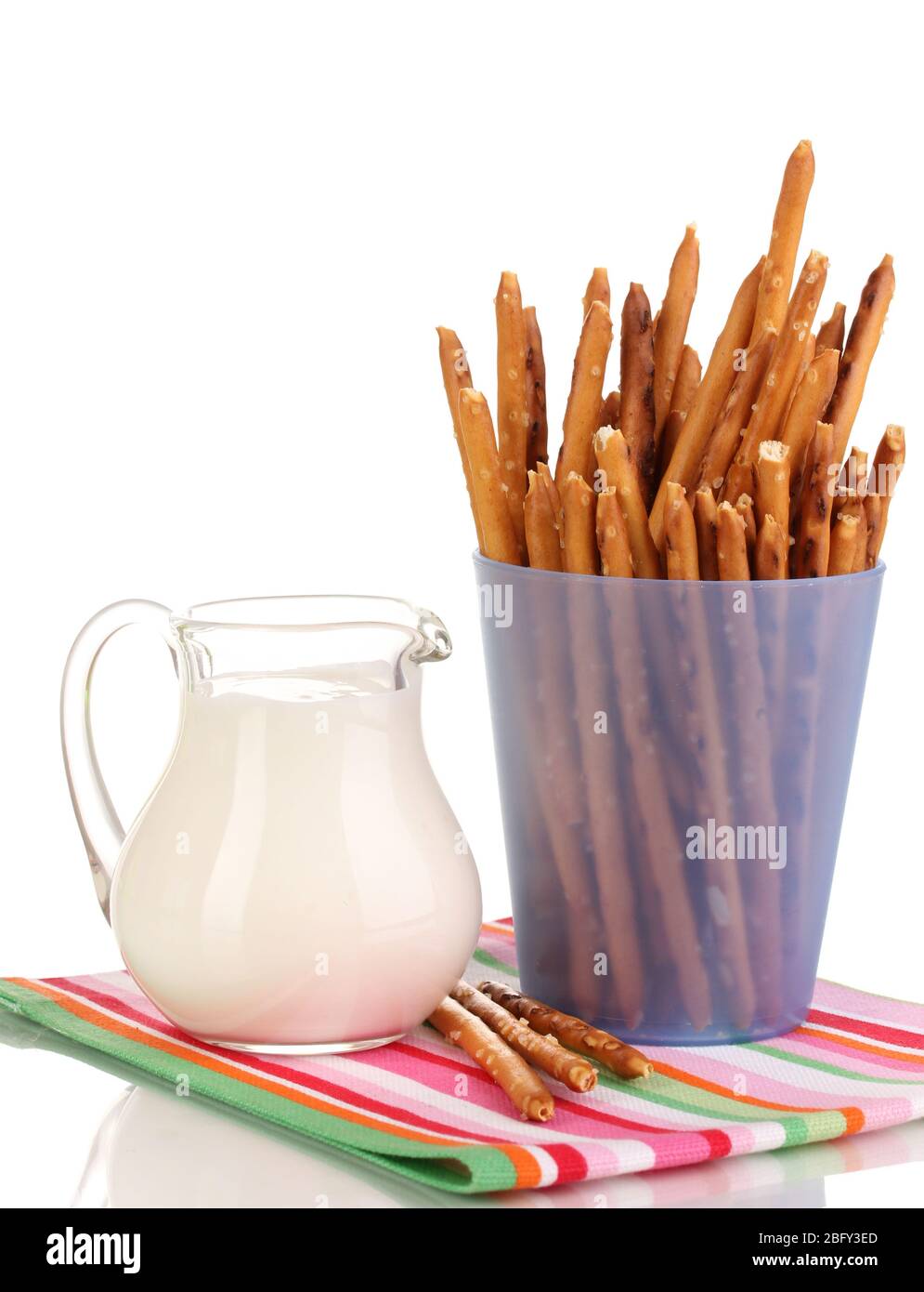 Tasty crispy sticks in purple plastic cup isolated on white Stock Photo ...