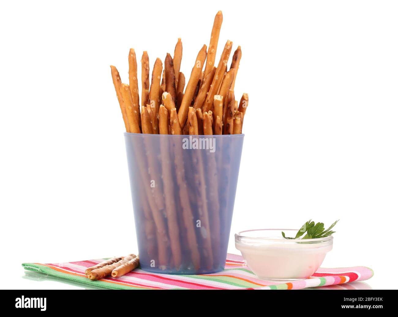 Tasty crispy sticks in purple plastic cup isolated on white Stock Photo ...