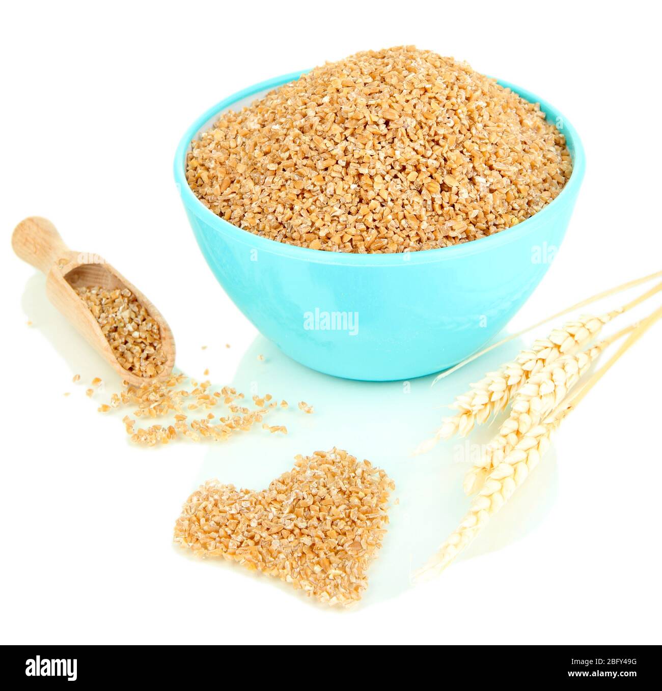 Blue bowl full of wheat bran isolated on white Stock Photo - Alamy