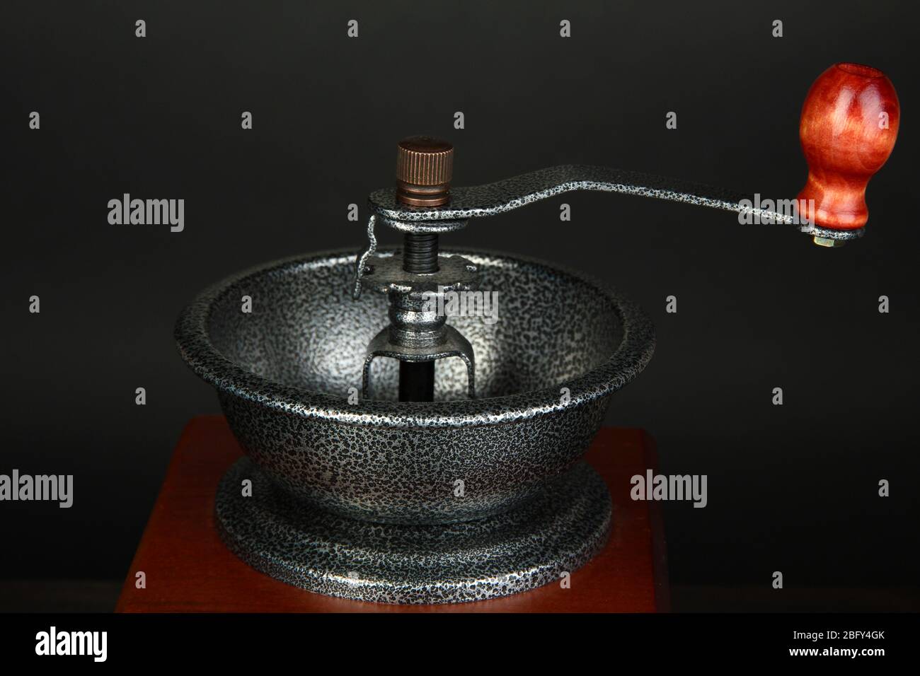 Coffee grinder on grey background Stock Photo - Alamy
