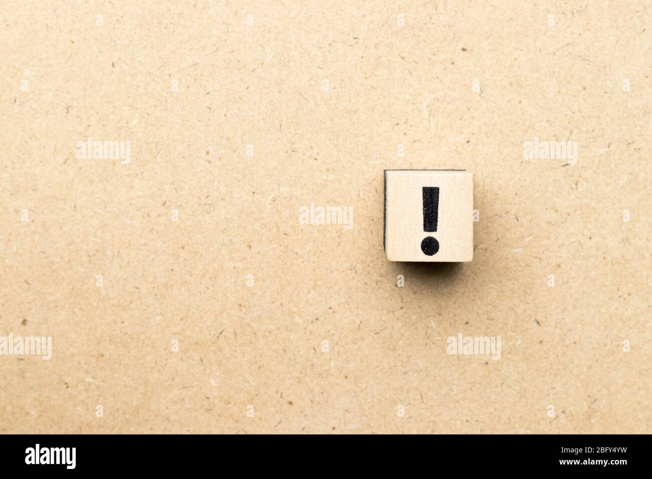Alphabet letter block in exclamation mark sign on wood background Stock ...
