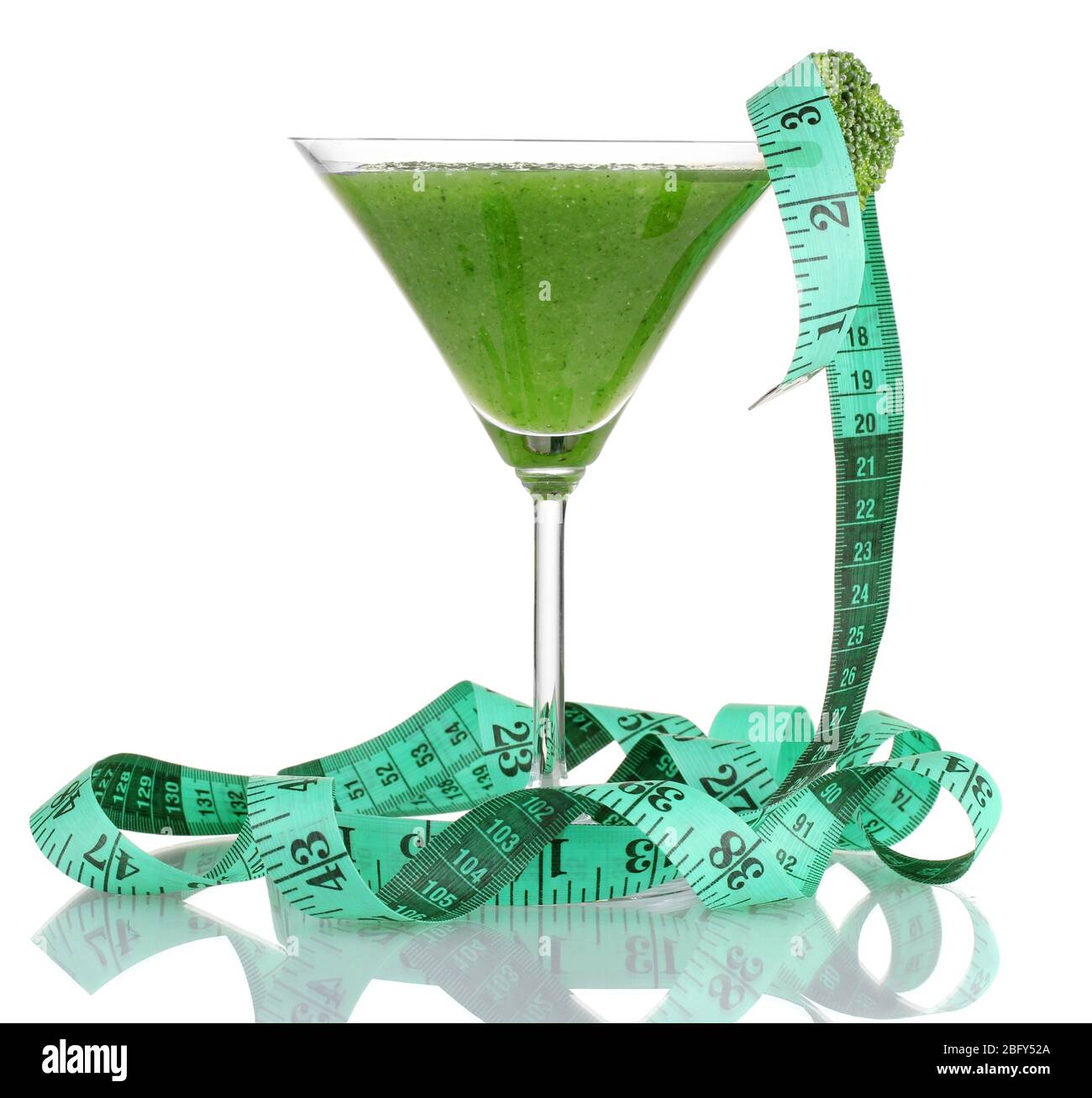 Green vegetable juice in coctail glass isolated on white Stock Photo ...