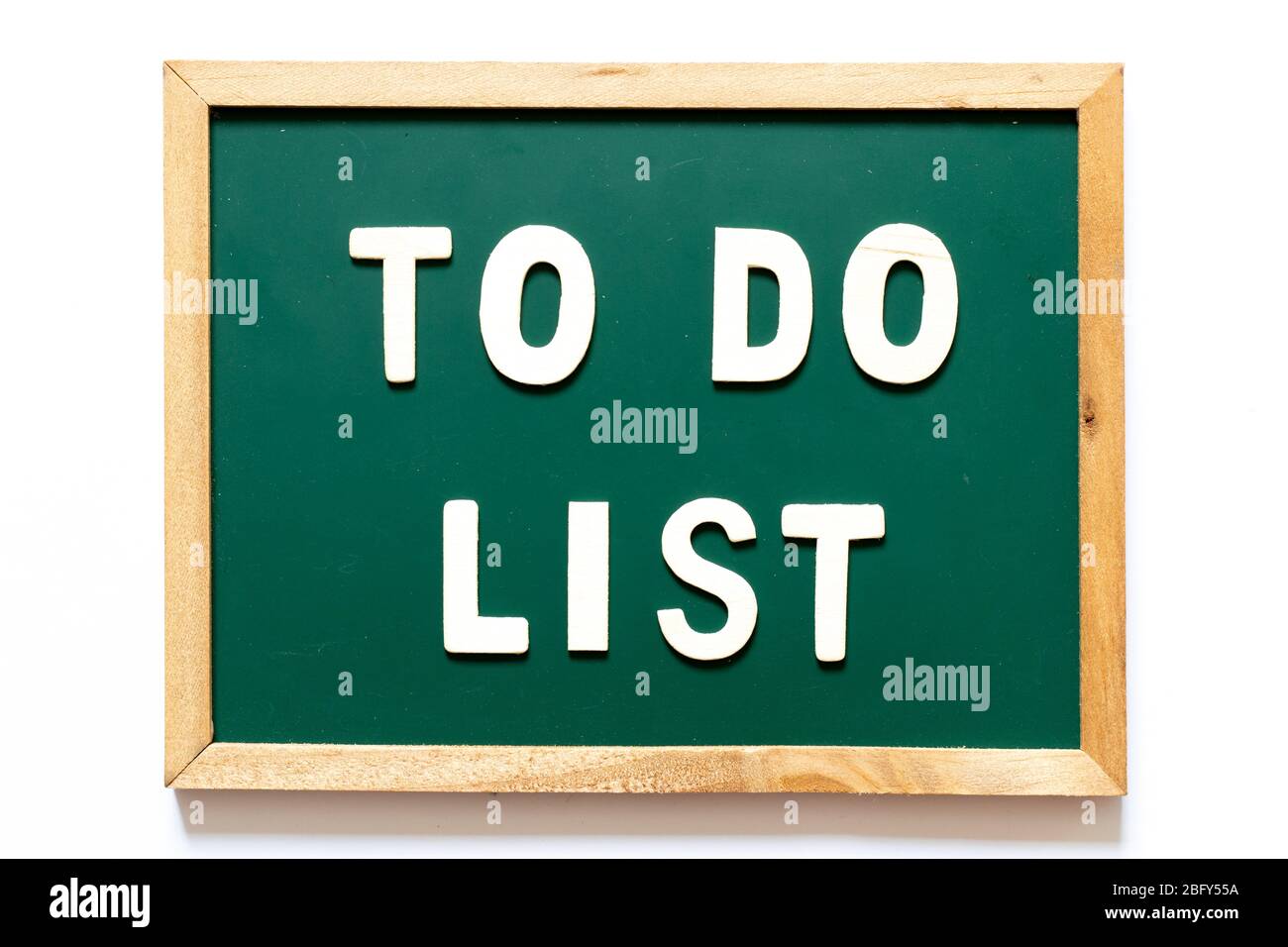 Green blackboard and wood frame with word to do list on white ...