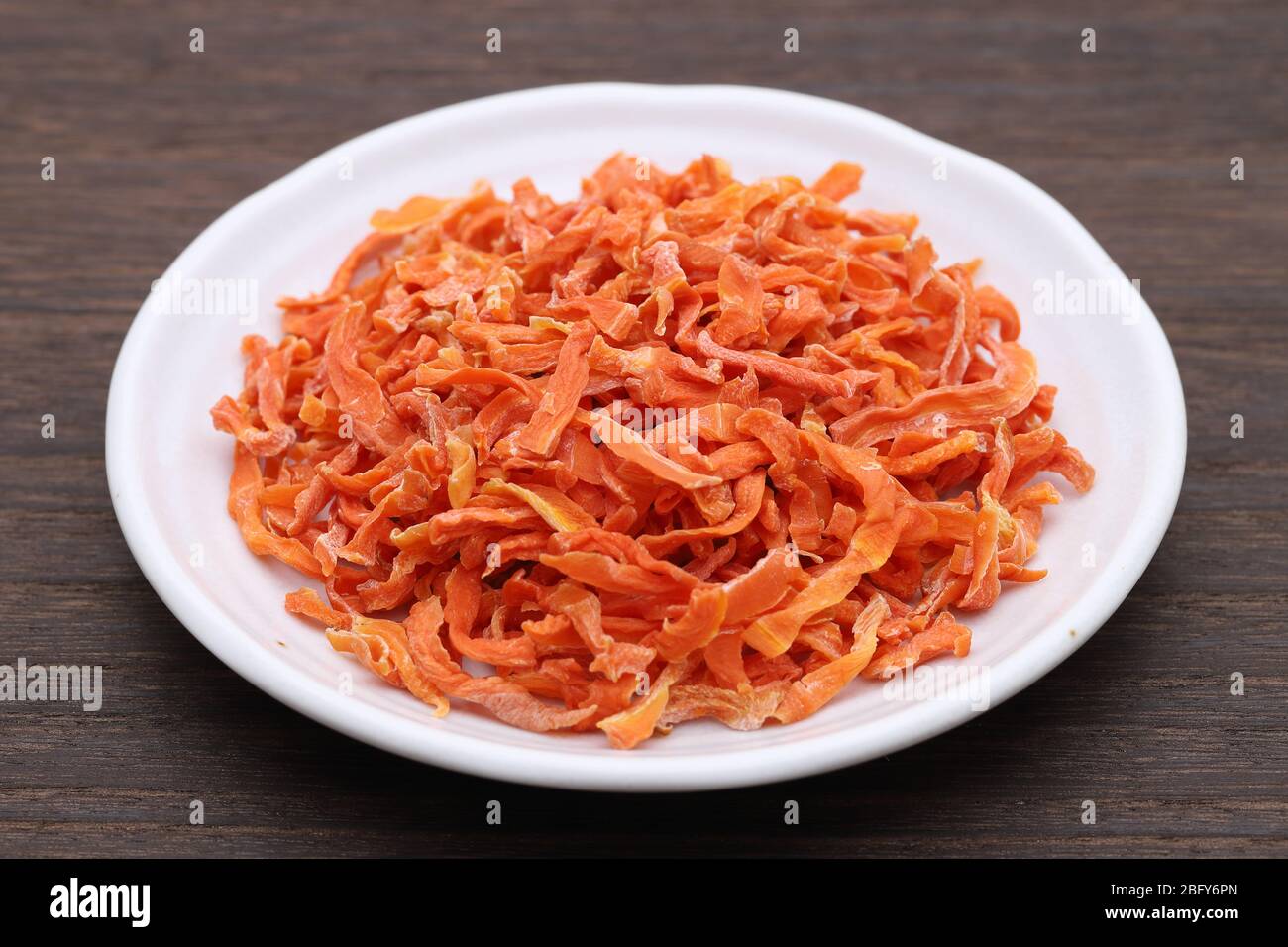 Dried chopped carrots isolated on white background, Dry carrot flakes ...