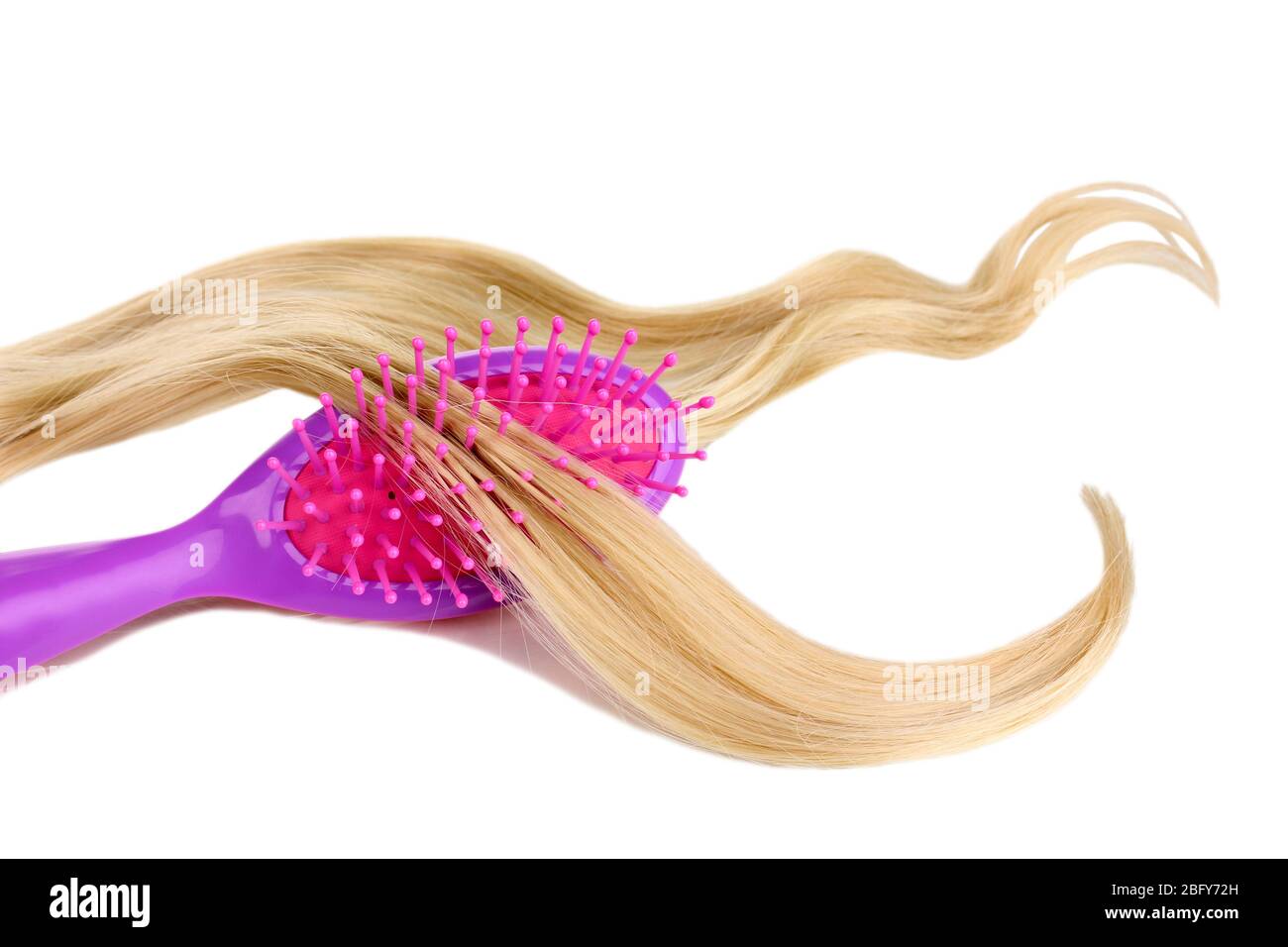 Blond curls brushing comb isolated on white Stock Photo - Alamy