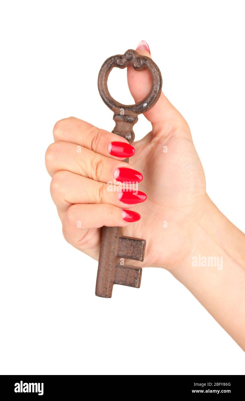 Hand with key isolated on white Stock Photo - Alamy