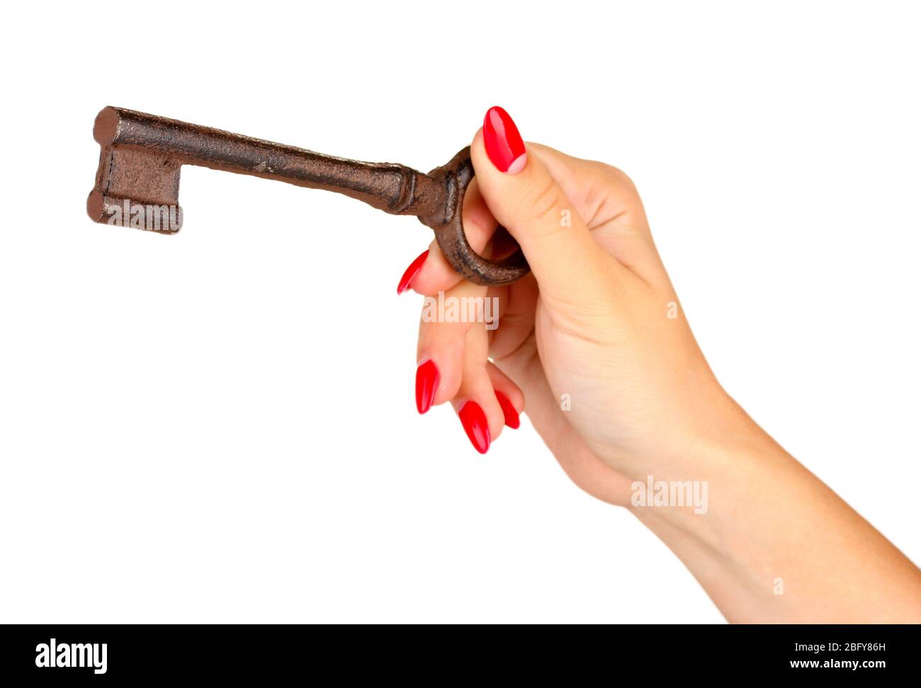 Hand with key isolated on white Stock Photo - Alamy
