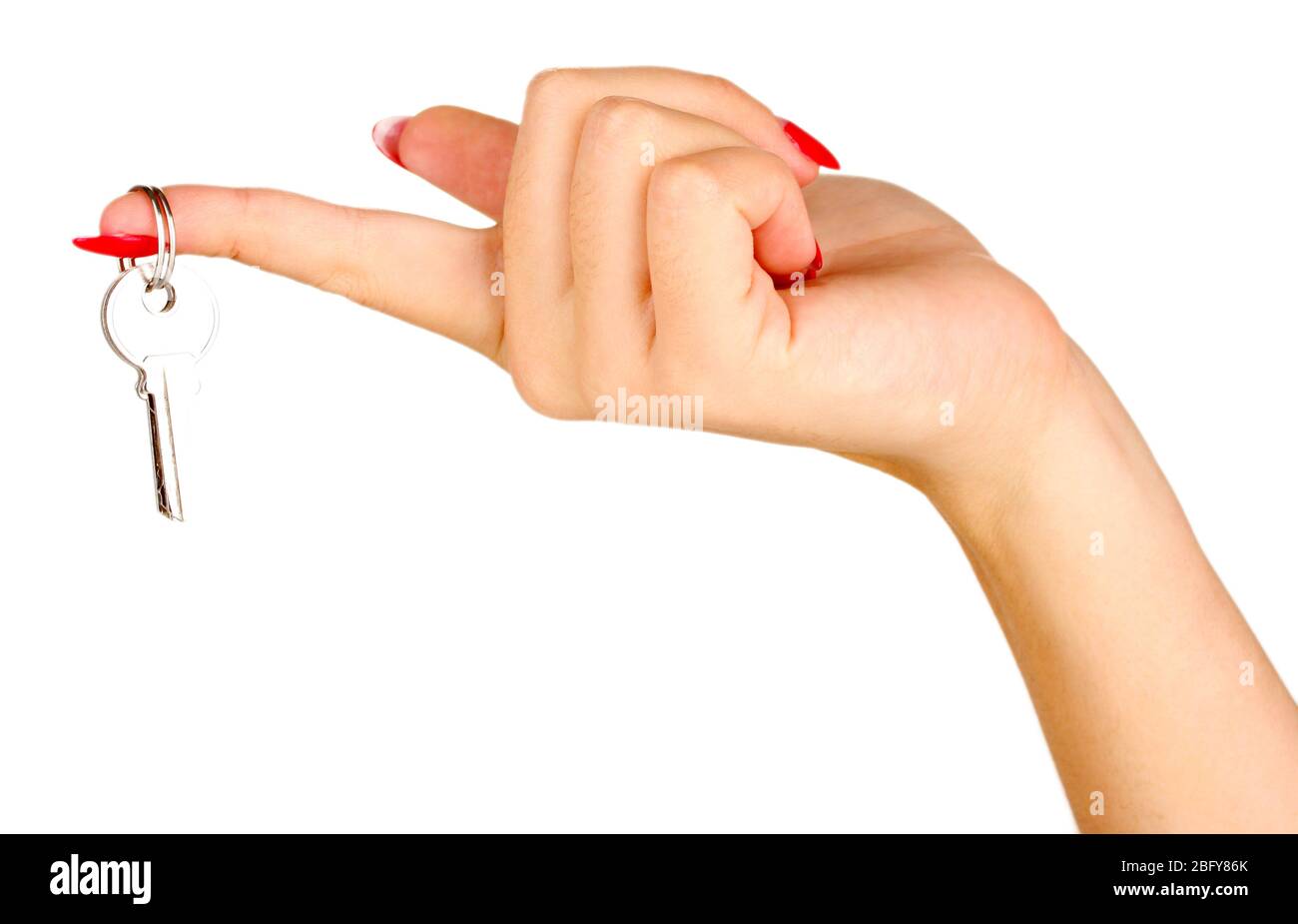 Hand with key isolated on white Stock Photo - Alamy