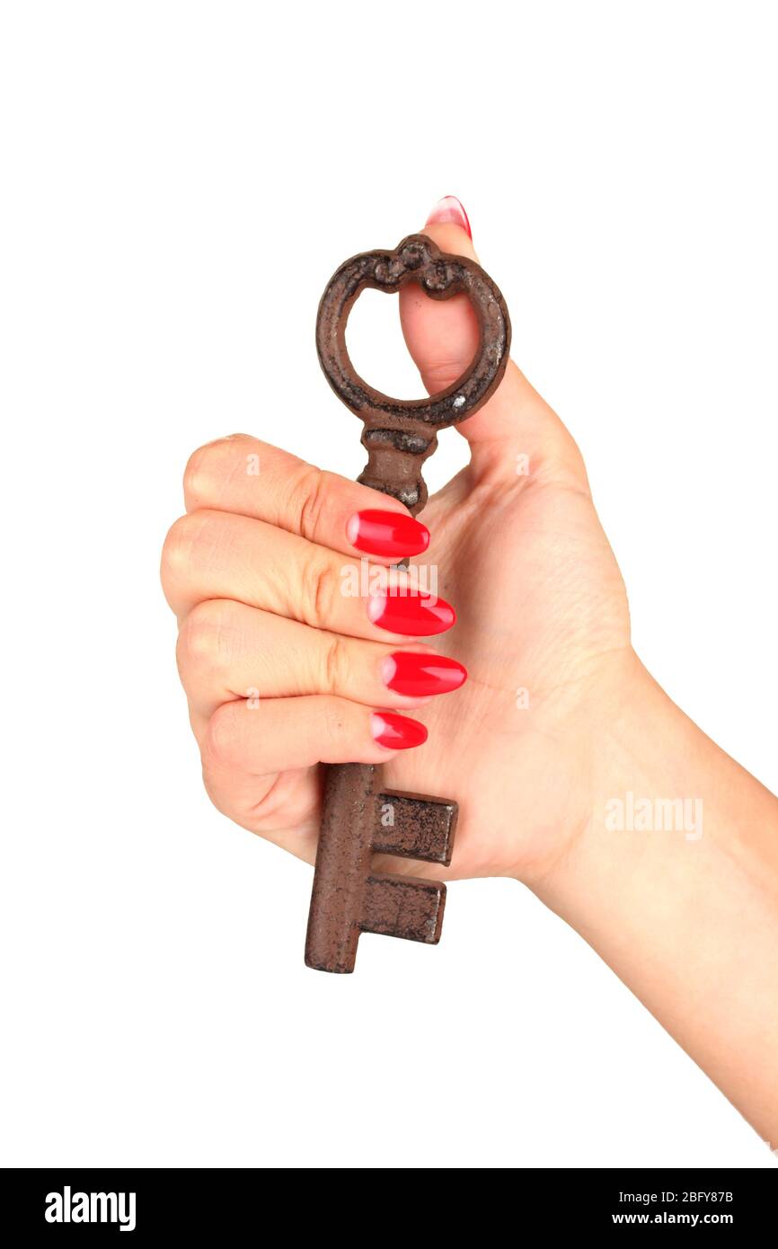 Hand with key isolated on white Stock Photo - Alamy