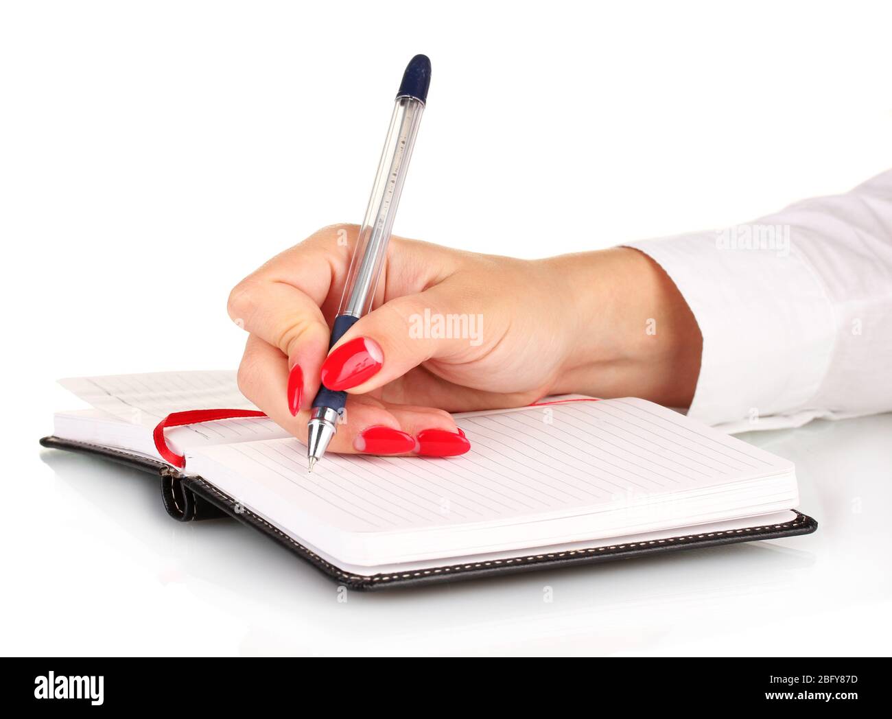 Hand signing in notebook isolated on white Stock Photo - Alamy