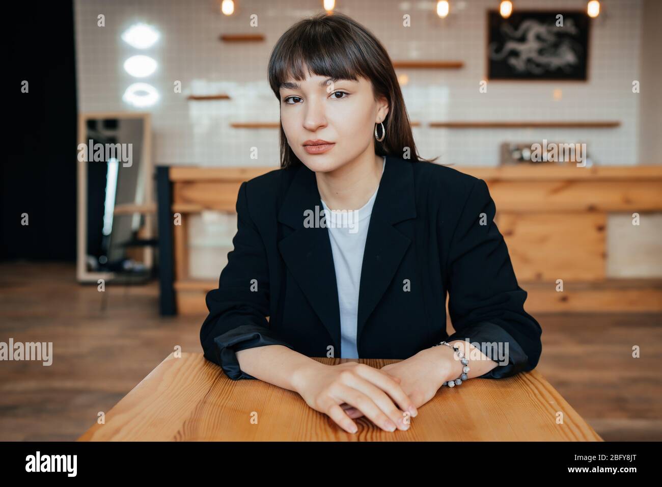 Young female candidate interviewed by employer. Portrait Stock Photo ...