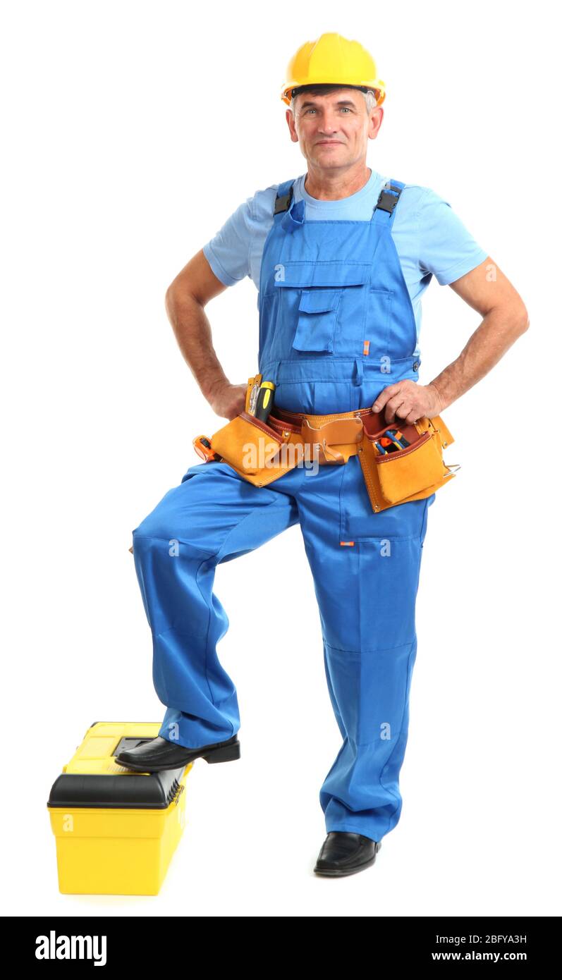 Male builder in yellow helmet isolated on white Stock Photo - Alamy