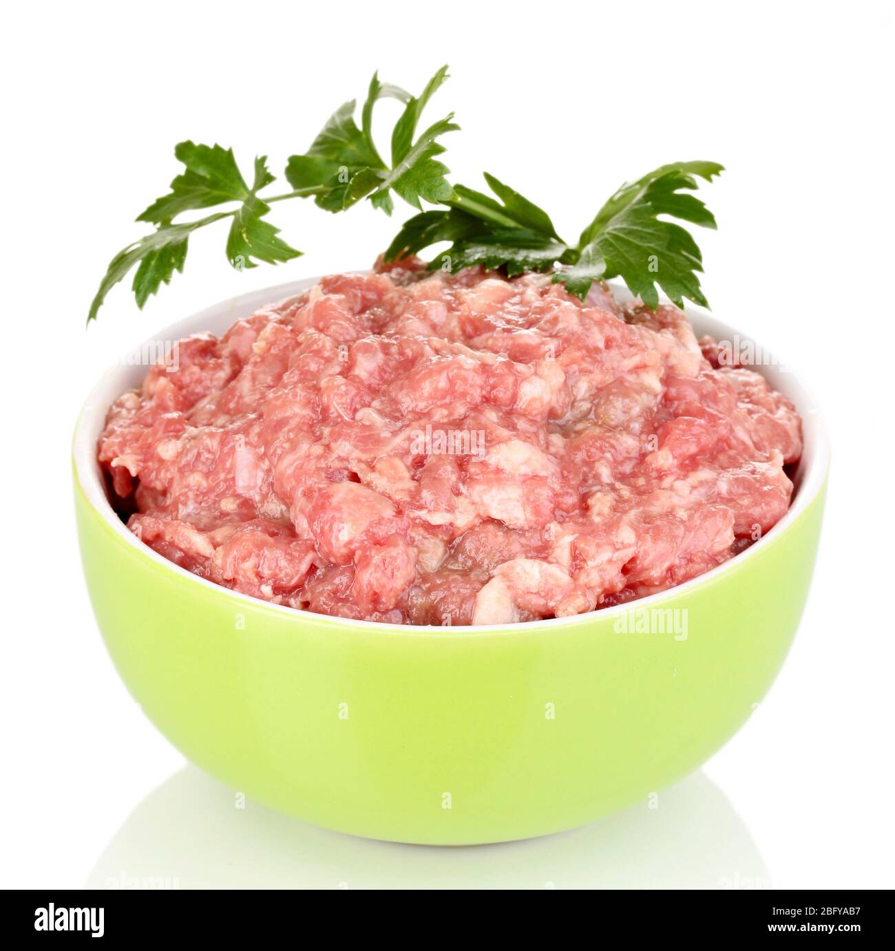 Bowl of raw ground meat isolated on white Stock Photo - Alamy