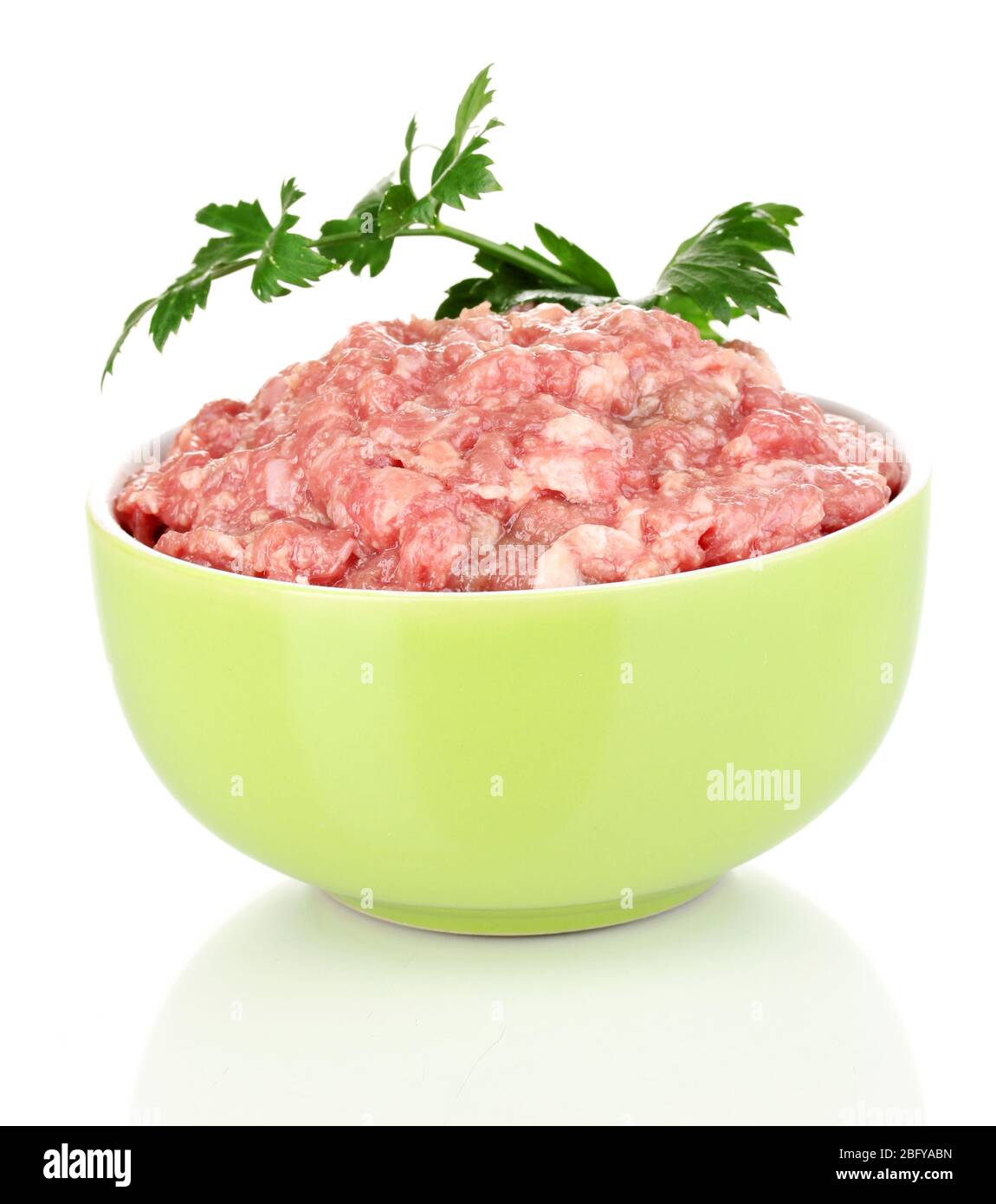 Bowl of raw ground meat isolated on white Stock Photo - Alamy