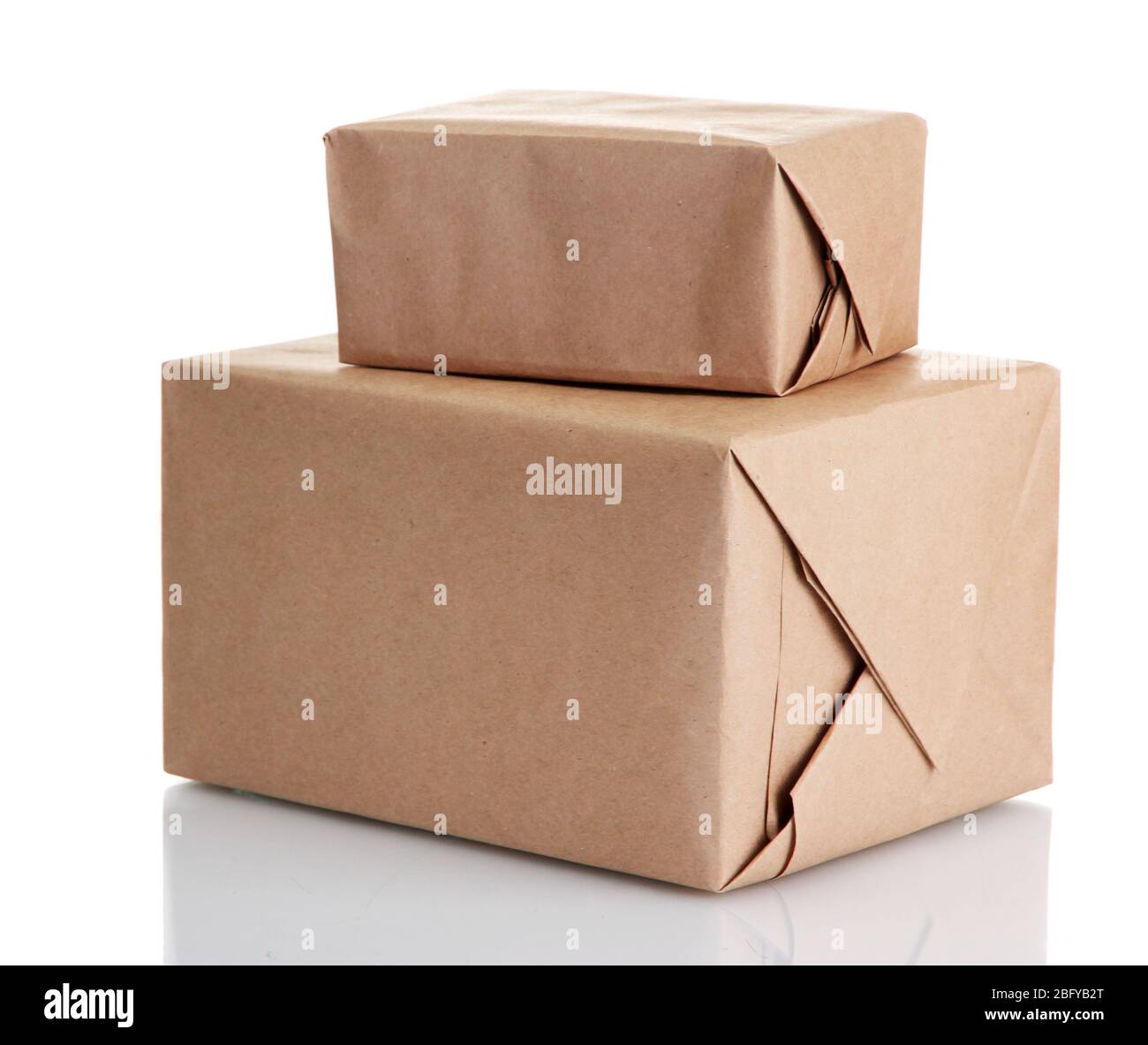 parcels boxes with kraft paper, isolated on white Stock Photo - Alamy