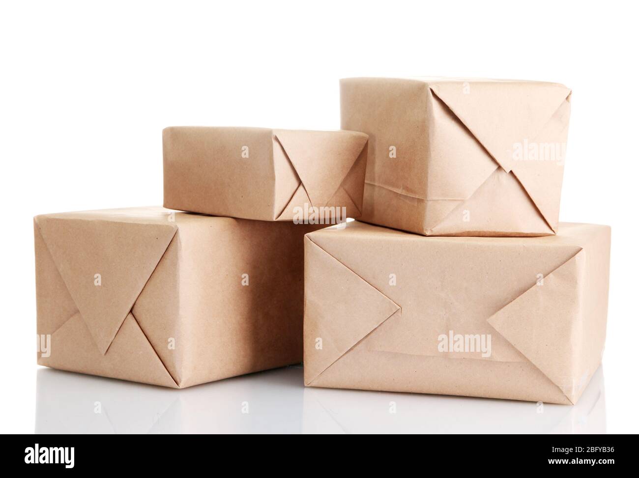 parcels boxes with kraft paper, isolated on white Stock Photo - Alamy
